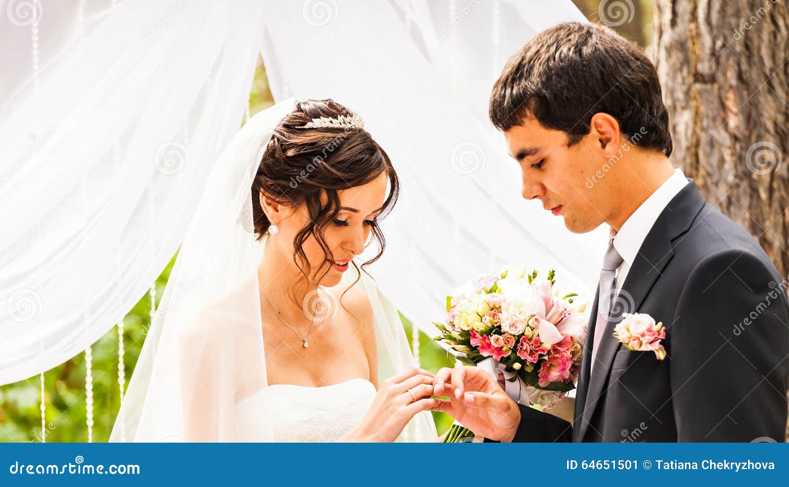 Groom Slipping Ring on Finger of Bride at Wedding Stock Image - Image ...