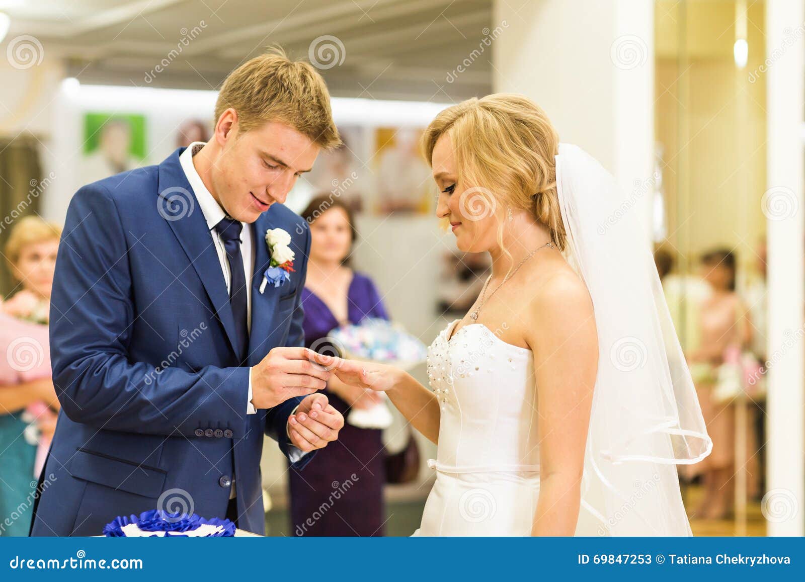 Groom Slipping Ring on Finger of Bride at Wedding Stock Image - Image ...