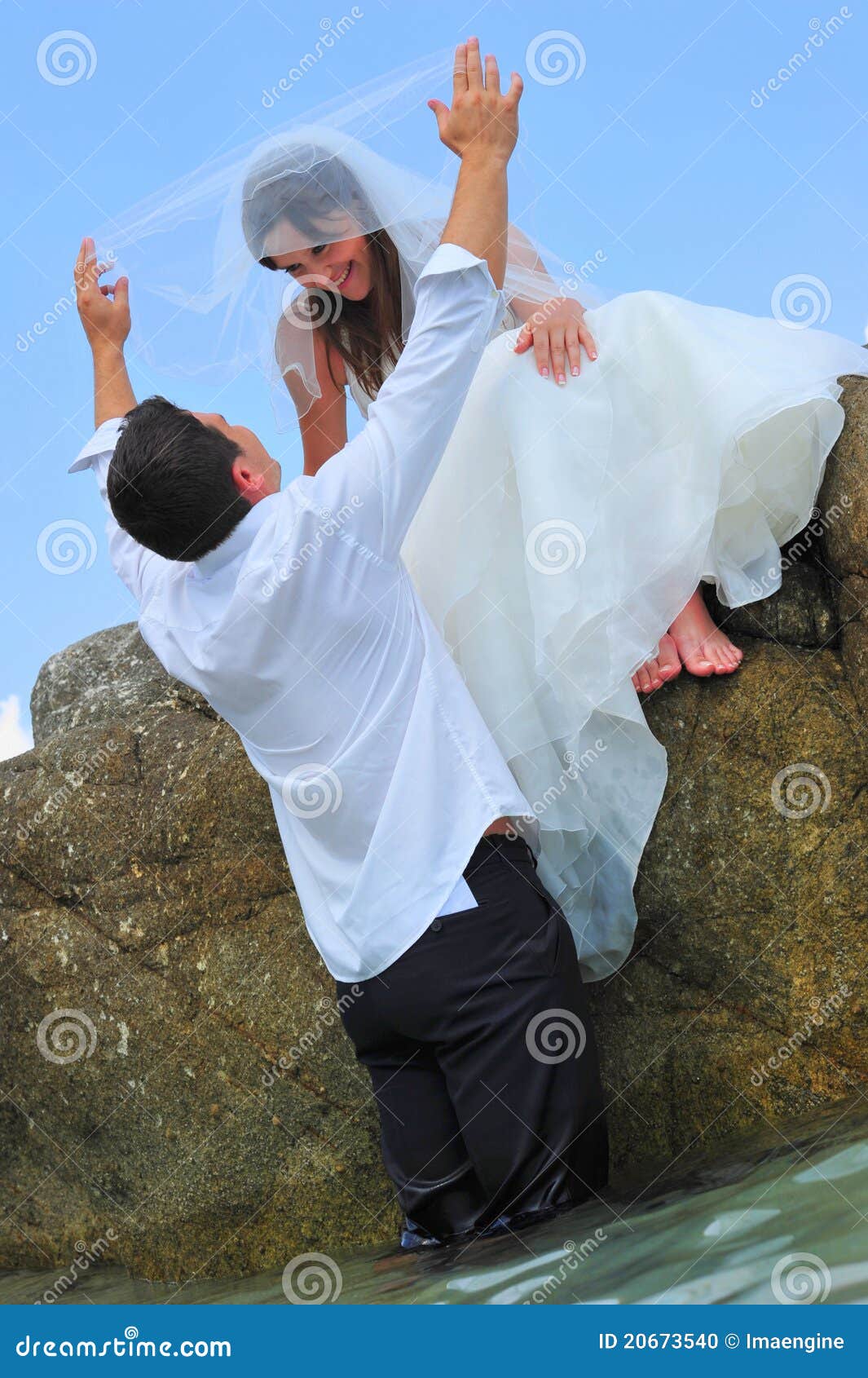 Groom unveiling his bride stock photo. Image of honeymoon - 20673540