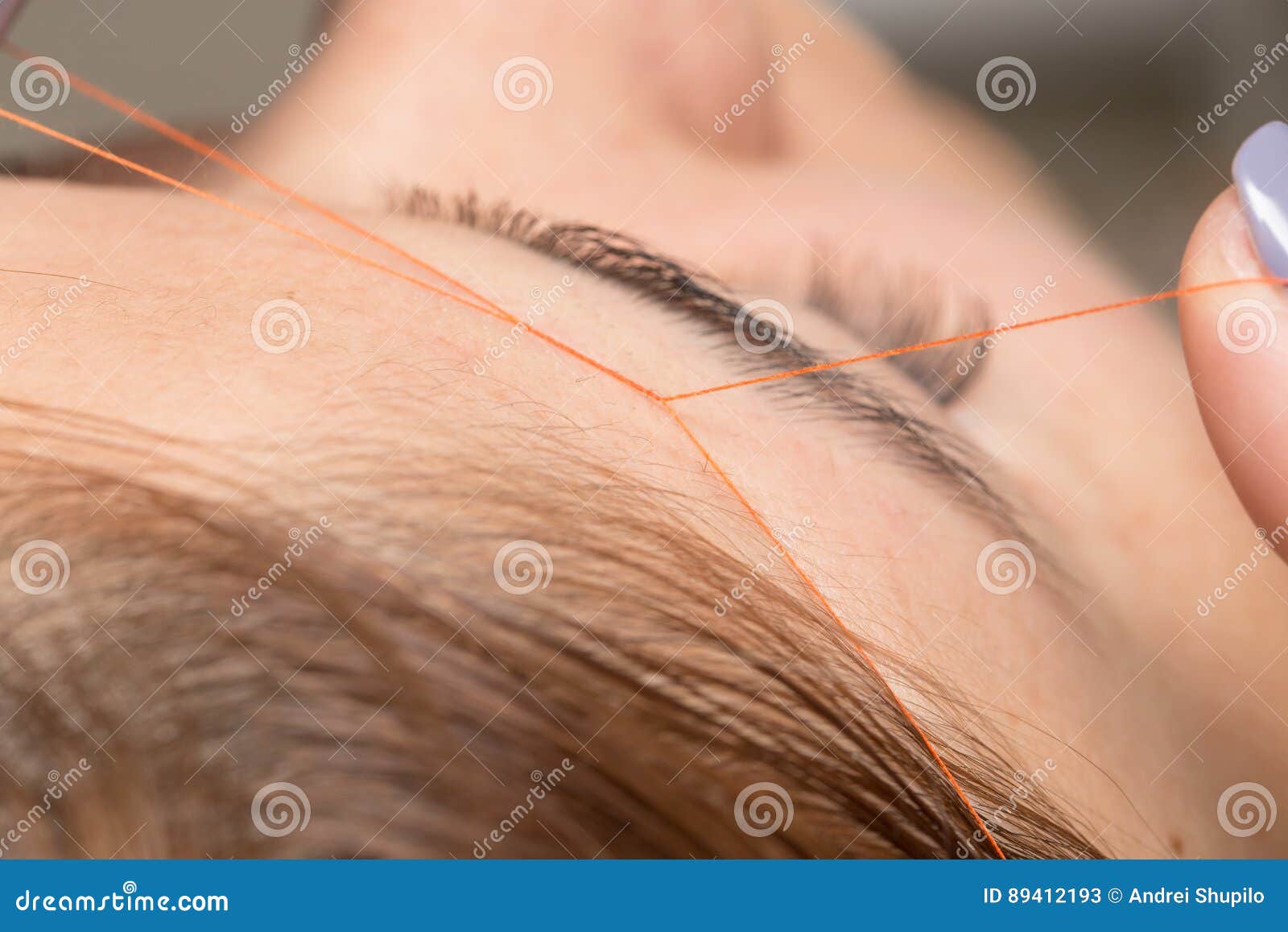 Grooming the Eyebrows Thread in a Beauty Salon Stock Image - Image of ...