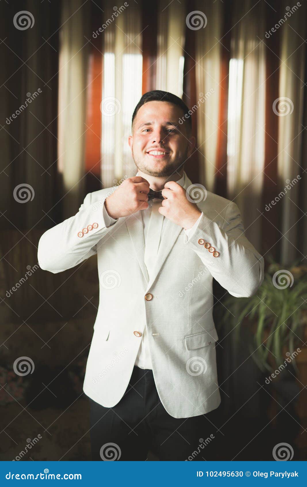 Grooms Morning Preparation. Handsome Man Getting Dressed and Preparing ...