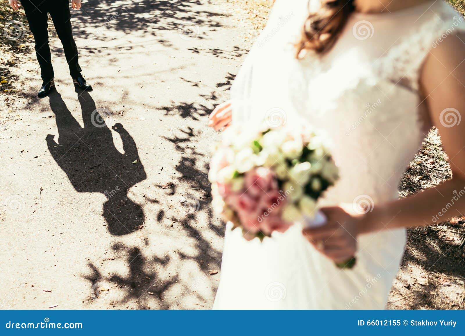 Grooms Shadow Nearly Bride with Wedding Bouquet Stock Image - Image of ...