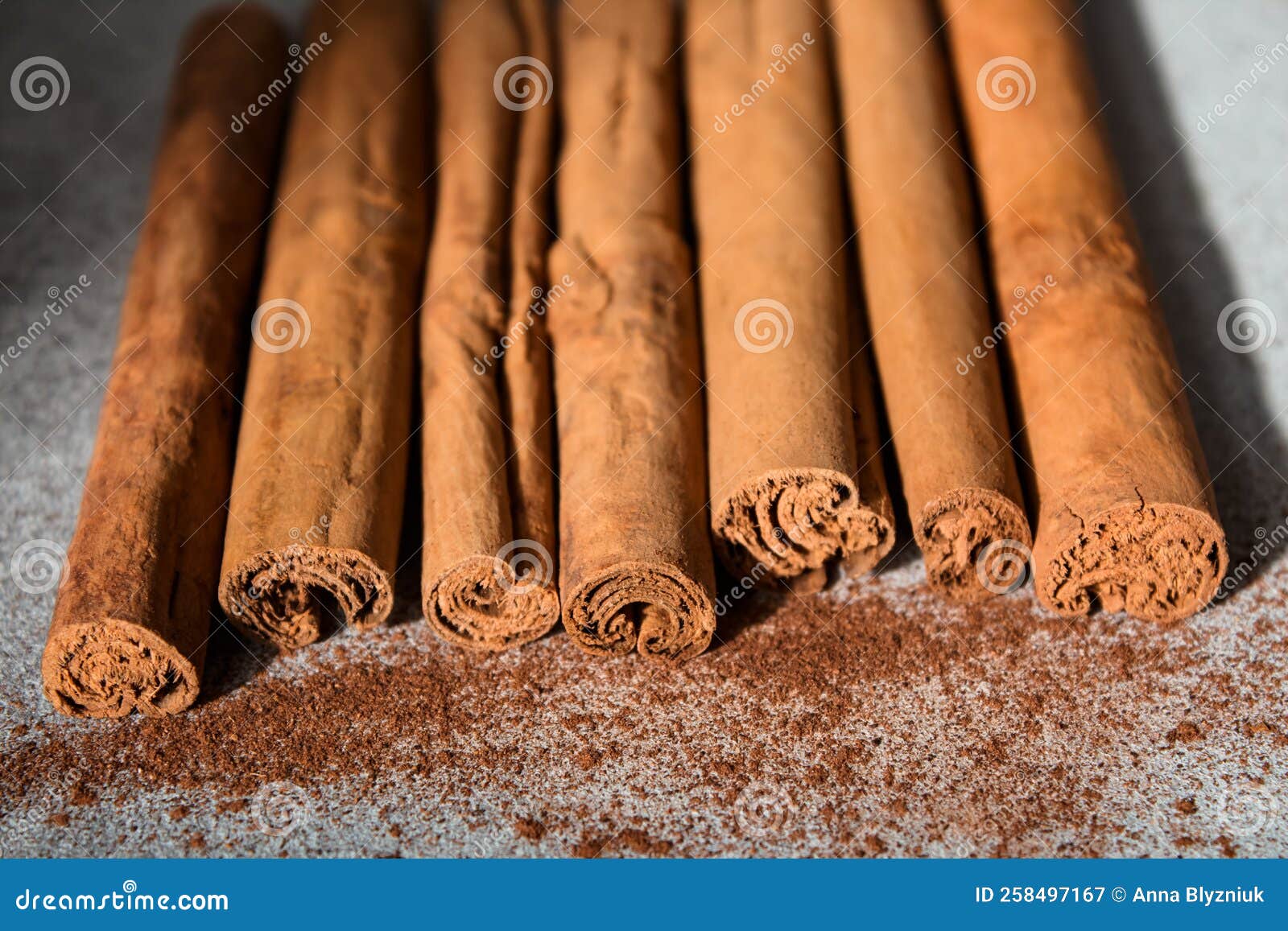 Ground Ceylon Cinnamon Sprinkled in Front of Real Cinnamon Sticks on a ...
