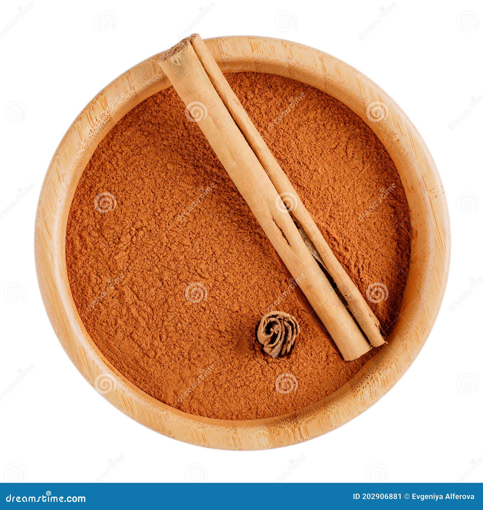 Ground Cinnamon and Cinnamon Sticks in Wooden Bowl Isolated on White ...