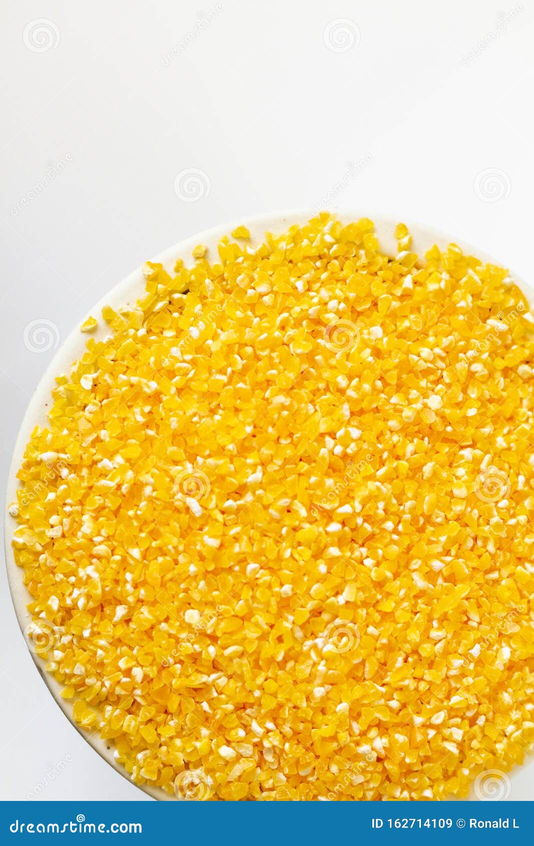 Ground corn in a bowl stock image. Image of lacrymajobi - 162714109