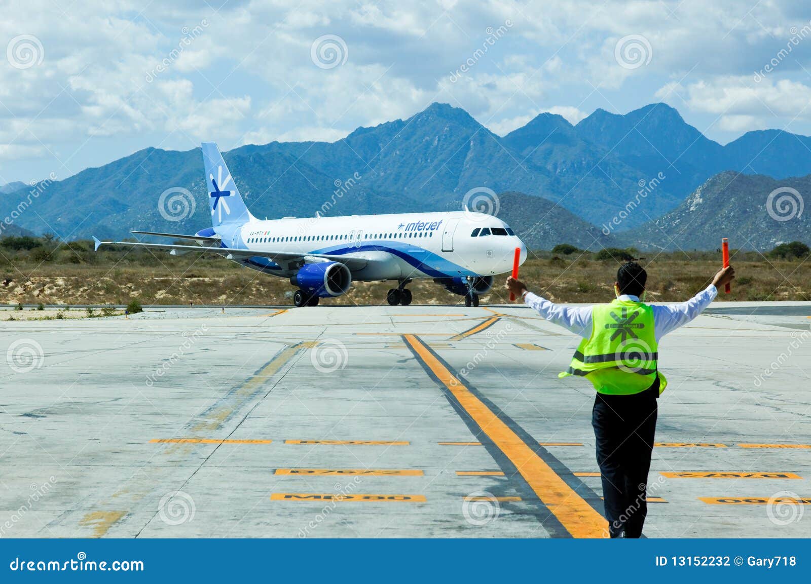 Ground Crew Guides a Jet To the Gate Editorial Photography - Image of ...