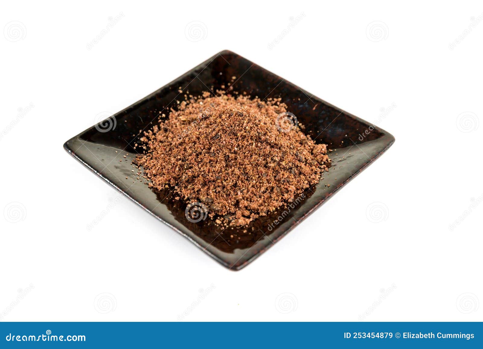 Ground Dried Sumac Berry Powder in a Black Ceramic Plate Stock Image ...