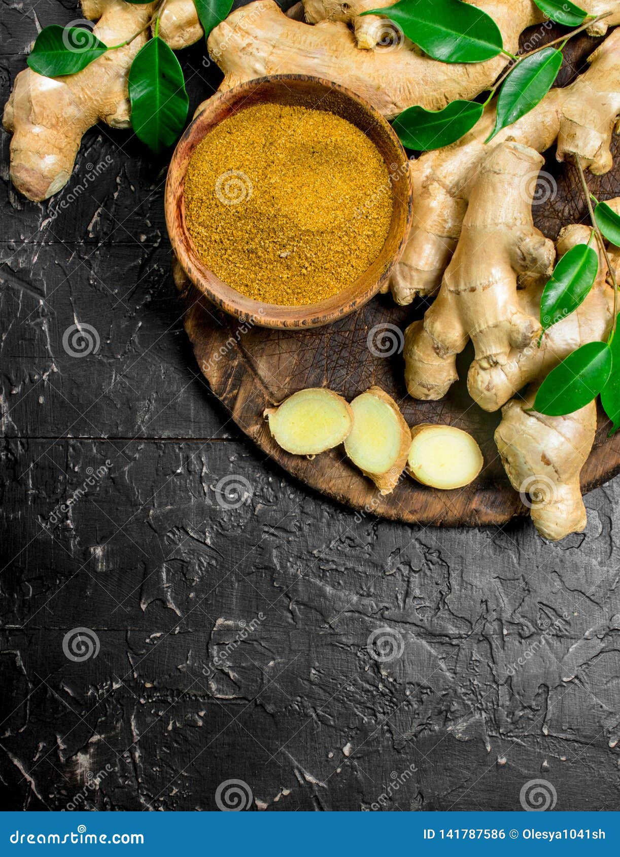 Ground and Fresh Sliced Ginger on a Cutting Board Stock Photo - Image ...