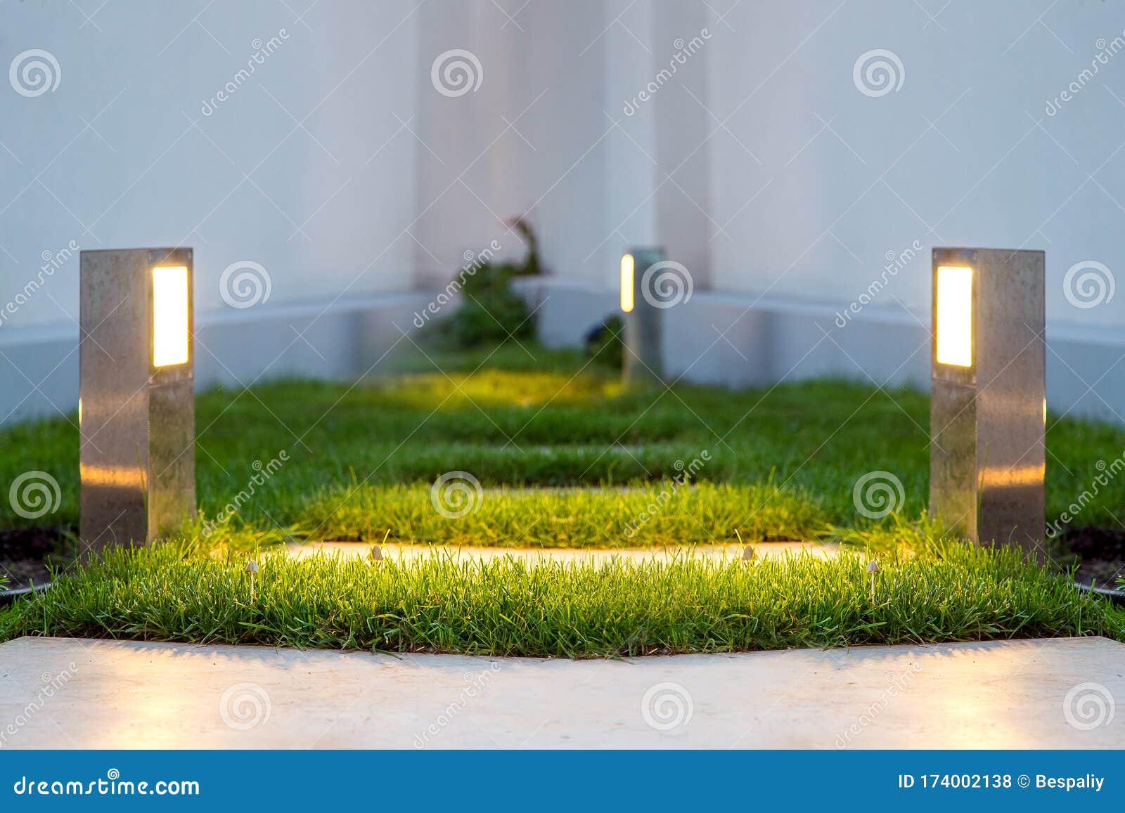 Ground Lantern Lighting Marble Walkway in the Evening Backyard. Stock ...