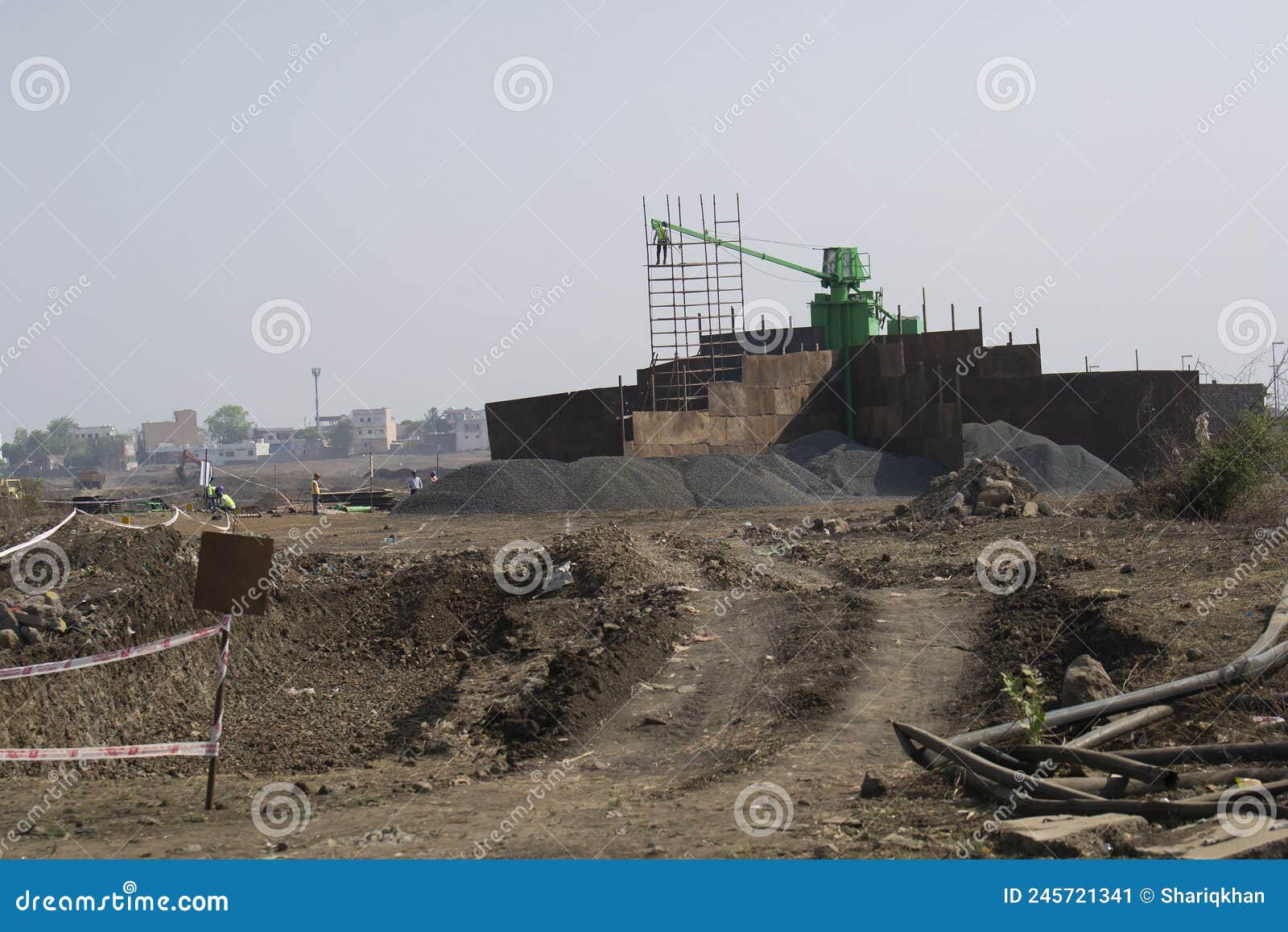 Ground Level Work at Construction Site with Cement Concrete Mixer Plant ...
