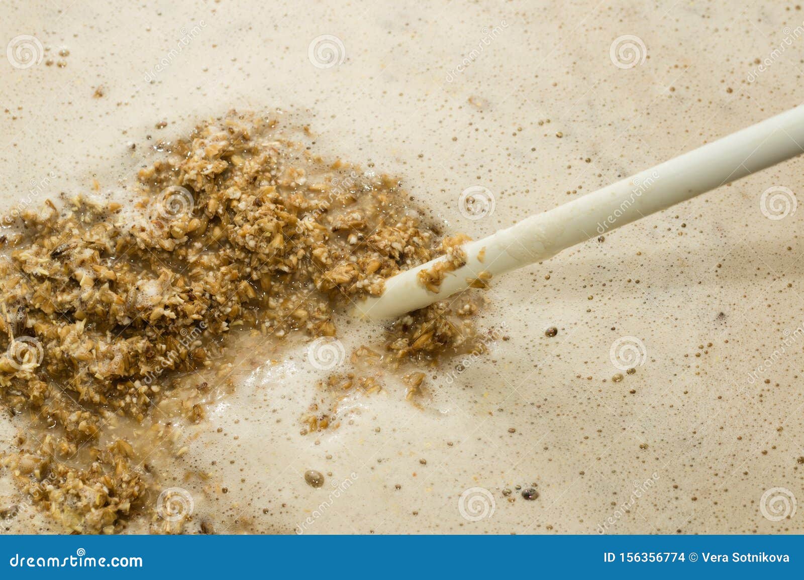 Ground Malt On A Spoon. Process Of Making Home Beer From Malt. Craft ...