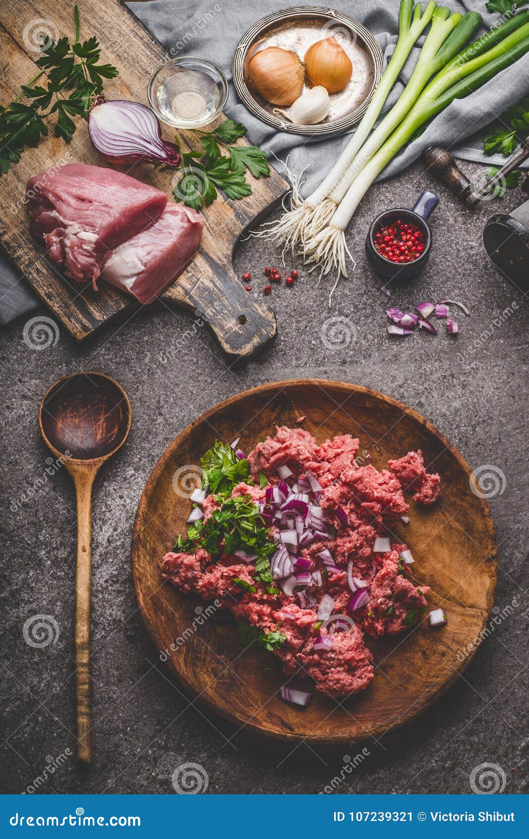 Ground Meat in Plate with Cooking Spoon with Ingredients on Rustic ...