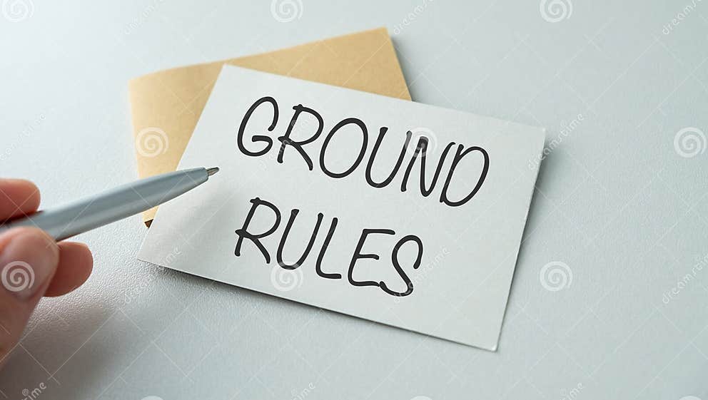 GROUND RULES - Words in White Notebook on Dark White Background with ...