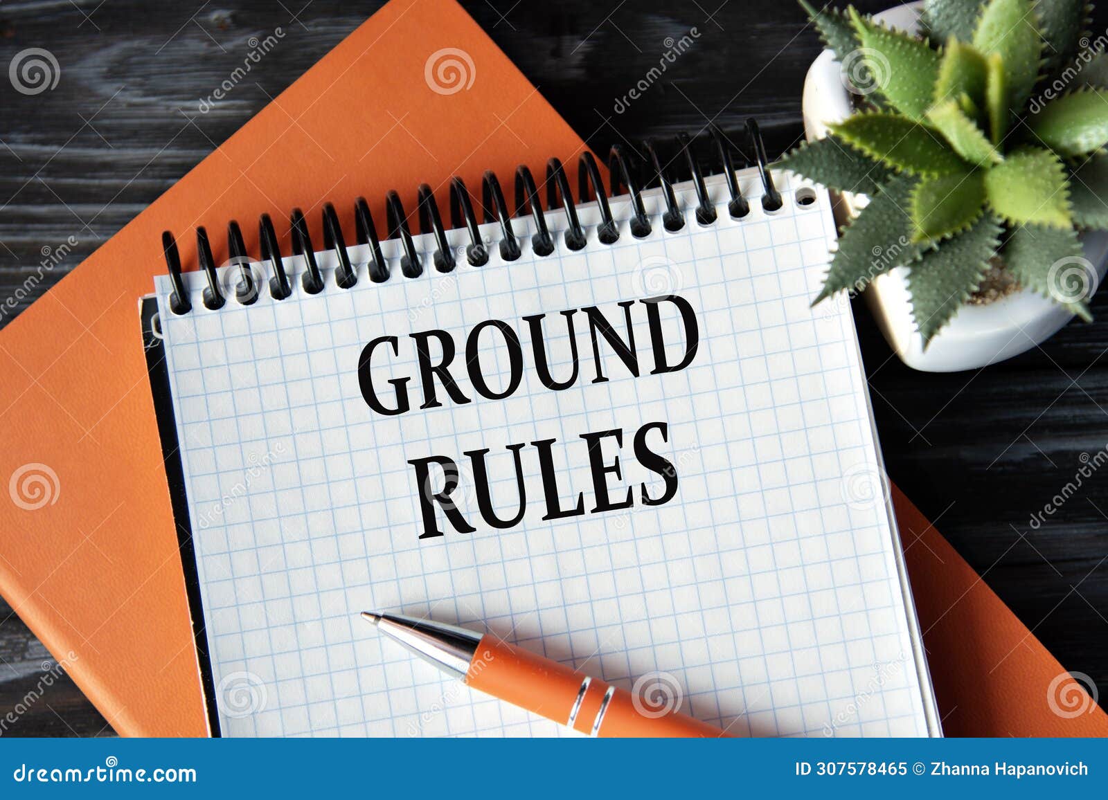 GROUND RULES - Words in White Notebook on Dark Wooden Background with ...