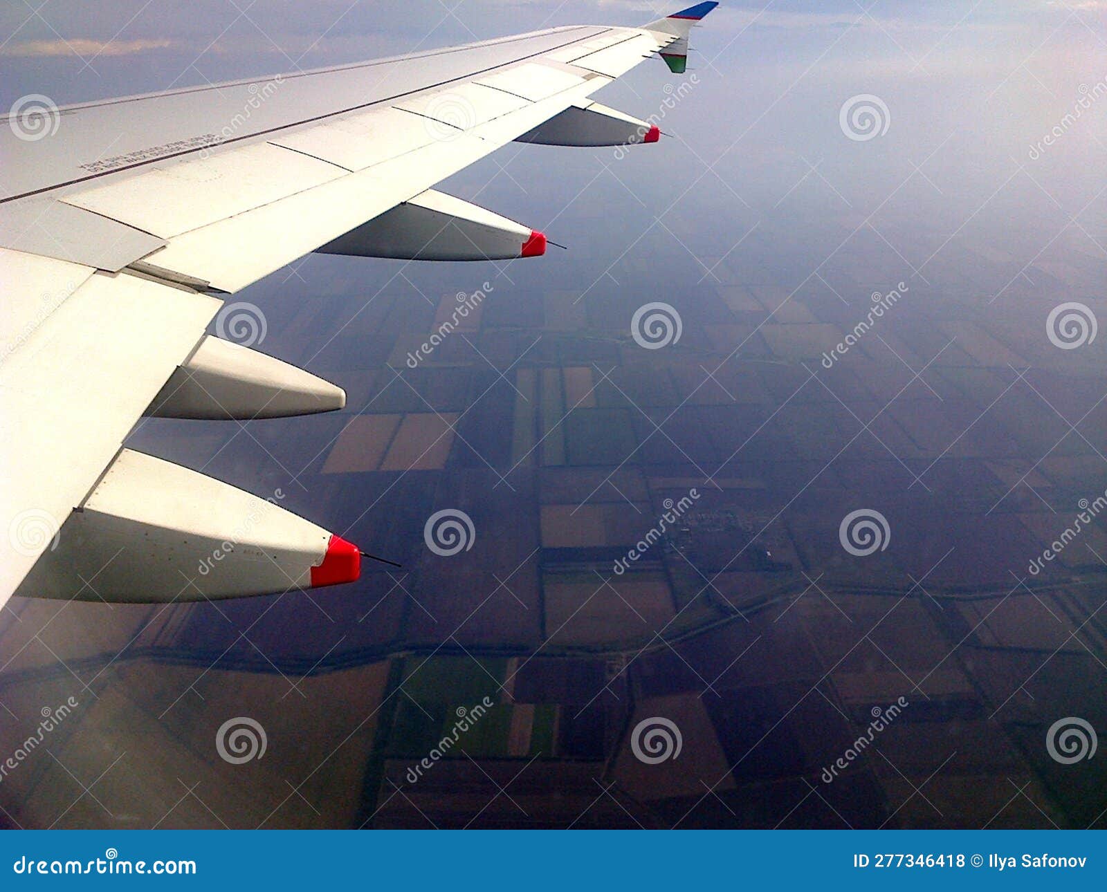 The Ground Under the Wing of the Aircraft Stock Photo - Image of height ...