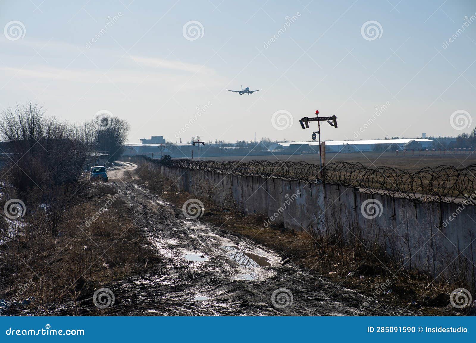 Ground View of a Landing Plane Against a Blue Sky. Stock Photo - Image ...