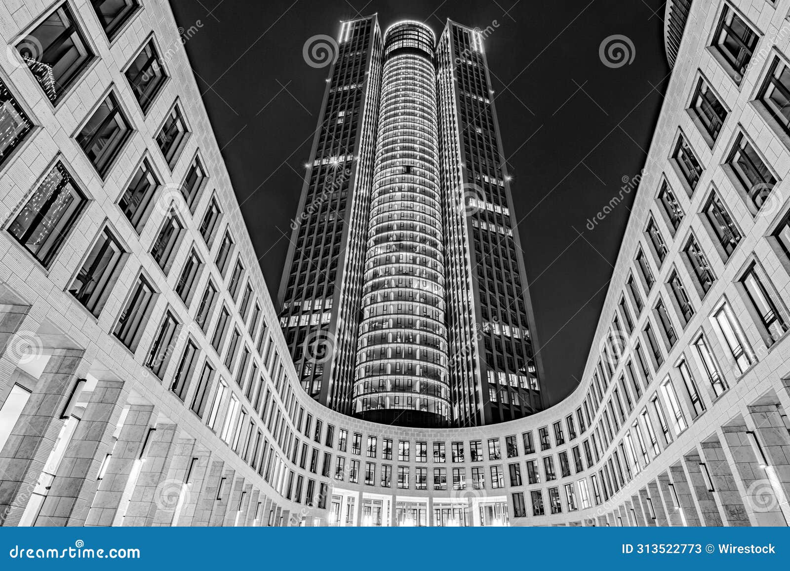 The Ground View of a Skyscraper in a Modern City at Night Editorial ...