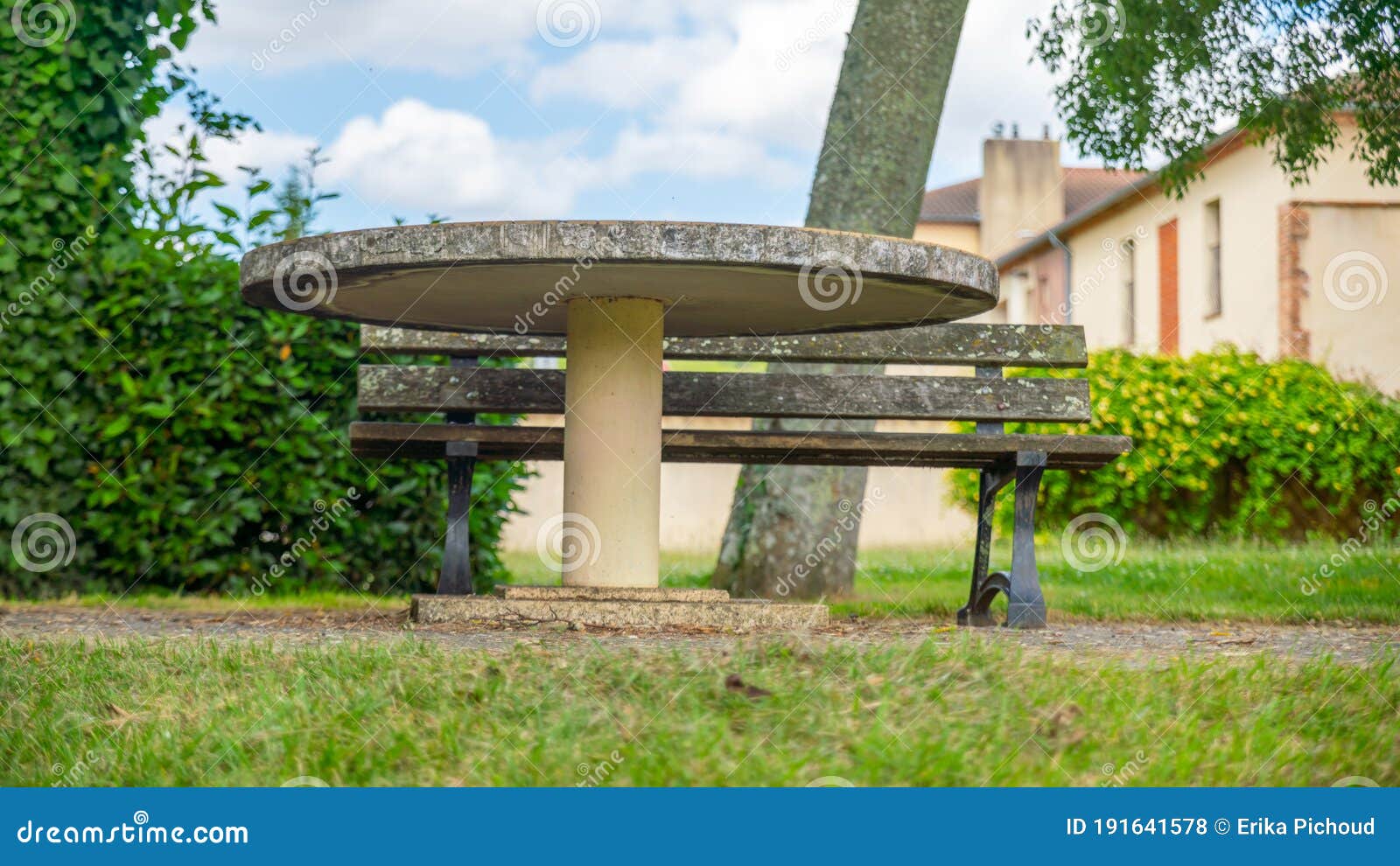 Ground View of a Round Stone Table and Bench Stock Photo - Image of ...