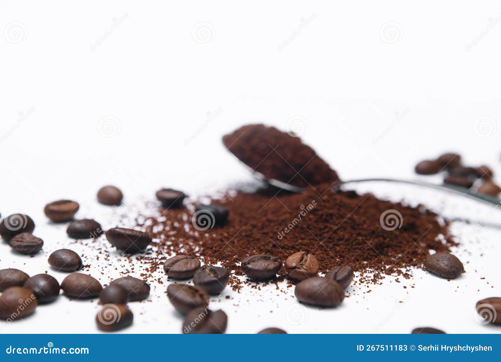 Grounded Coffee in a Spoon Surrounded with Beans Isolated Stock Image ...