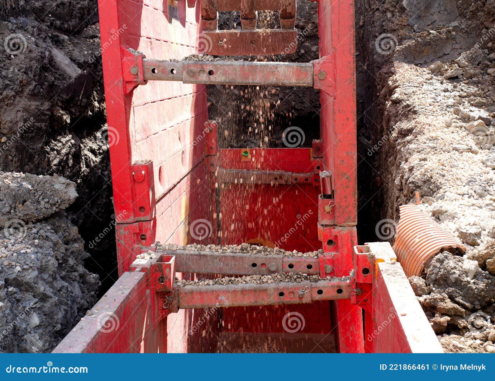 Groundworker Installing Clay Drainage Pipe while in the Trench ...