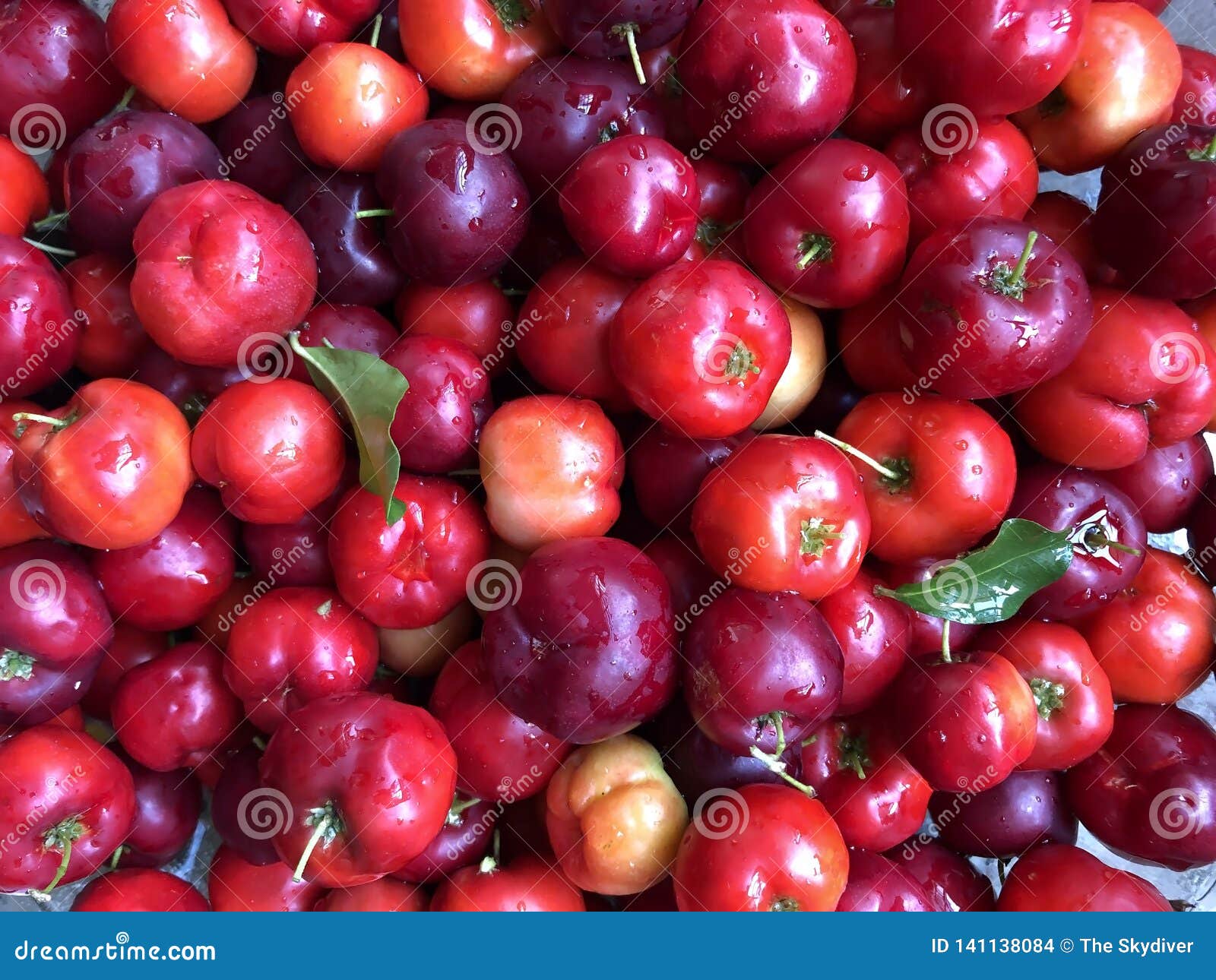 Group of acerolas stock photo. Image of colorful, closeup - 141138084