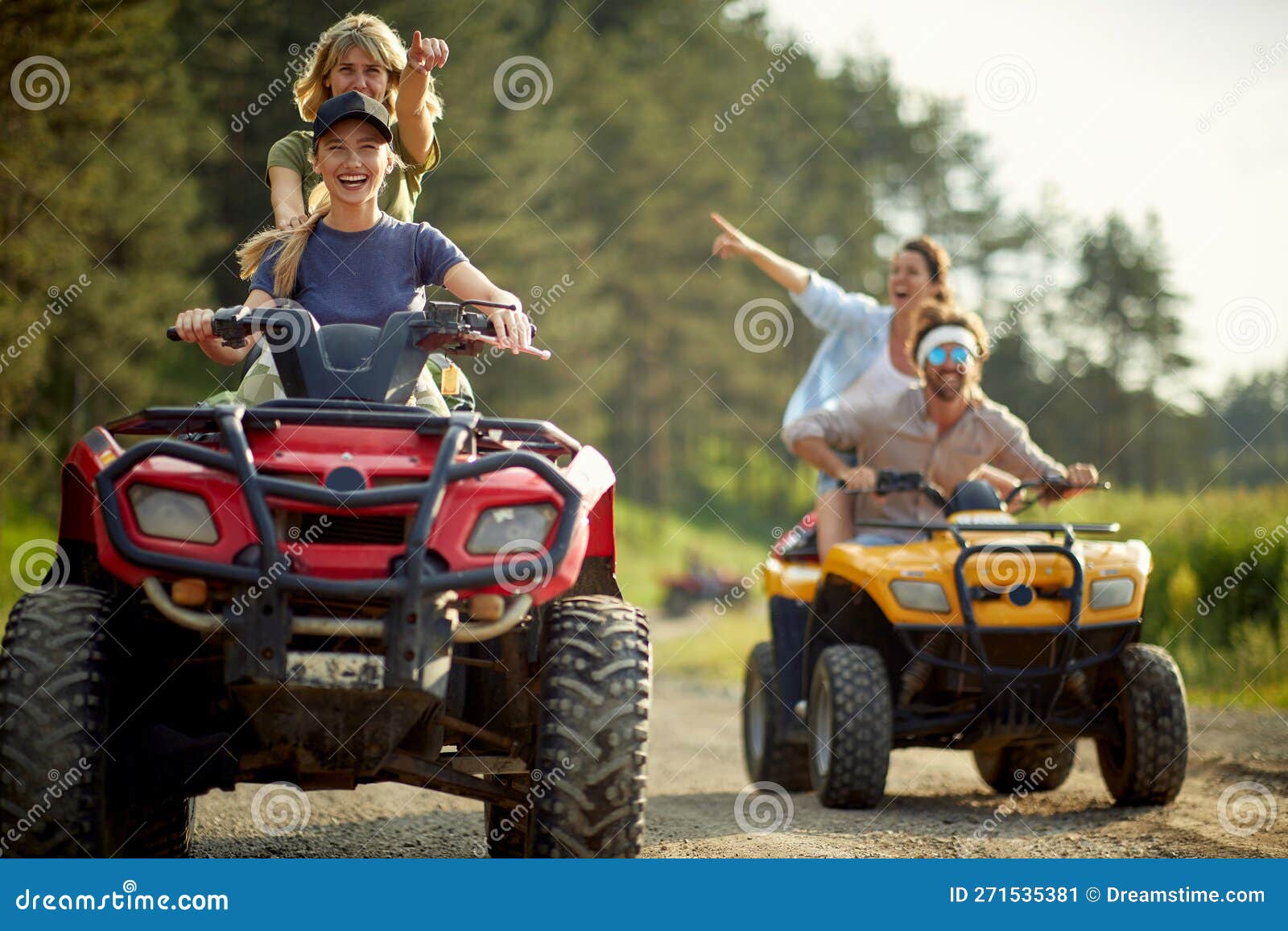 Group of Active Friends Driving Quads Together Stock Image - Image of ...