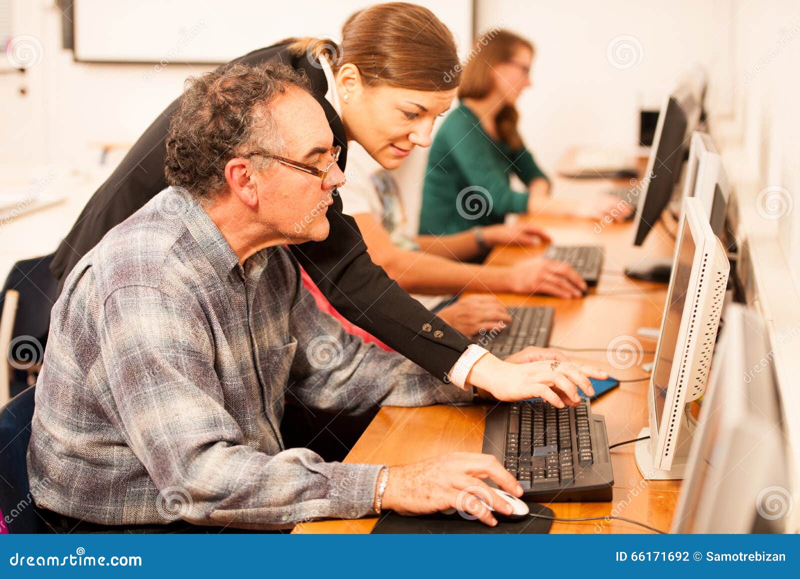 Group of Adults Learning Computer Skills. Intergenerational Tran Stock ...
