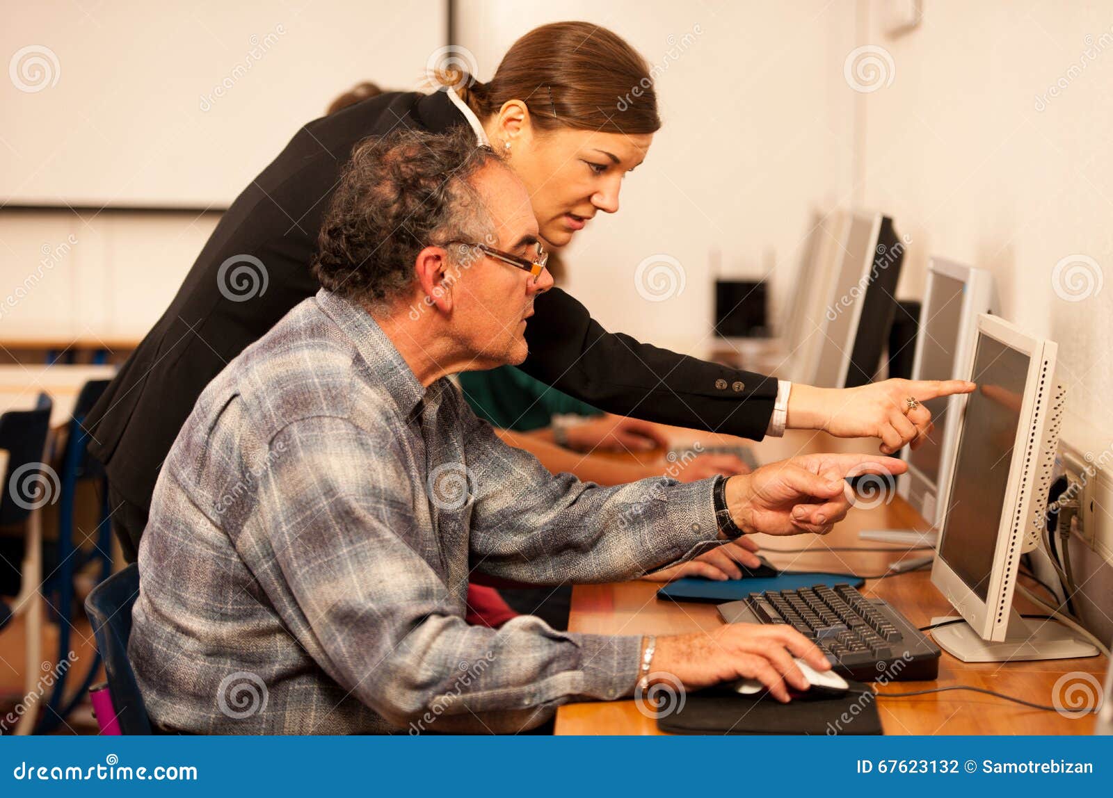 Group of Adults Learning Computer Skills. Intergenerational Tran Stock ...