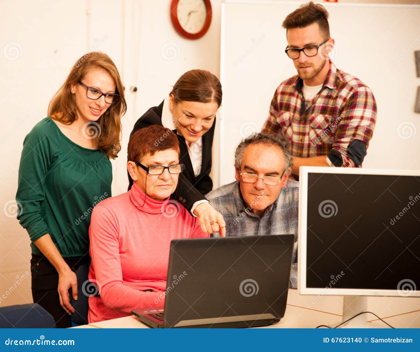 Group of Adults Learning Computer Skills. Intergenerational Tran Stock ...