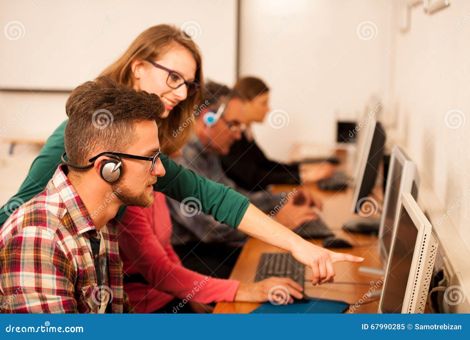 Group of Adults Learning Computer Skills. Intergenerational Tran Stock ...