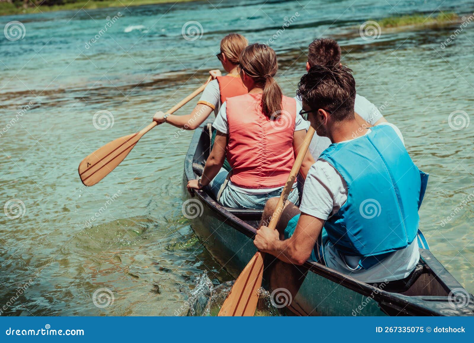 Group Adventurous Explorer Friends are Canoeing in a Wild River Stock ...