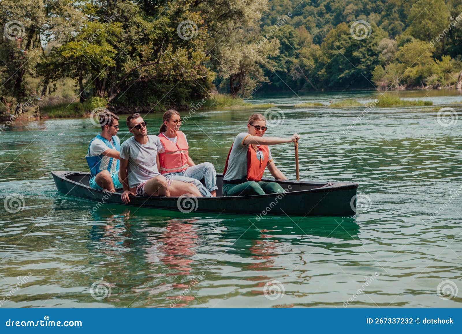 Group Adventurous Explorer Friends are Canoeing in a Wild River Stock ...