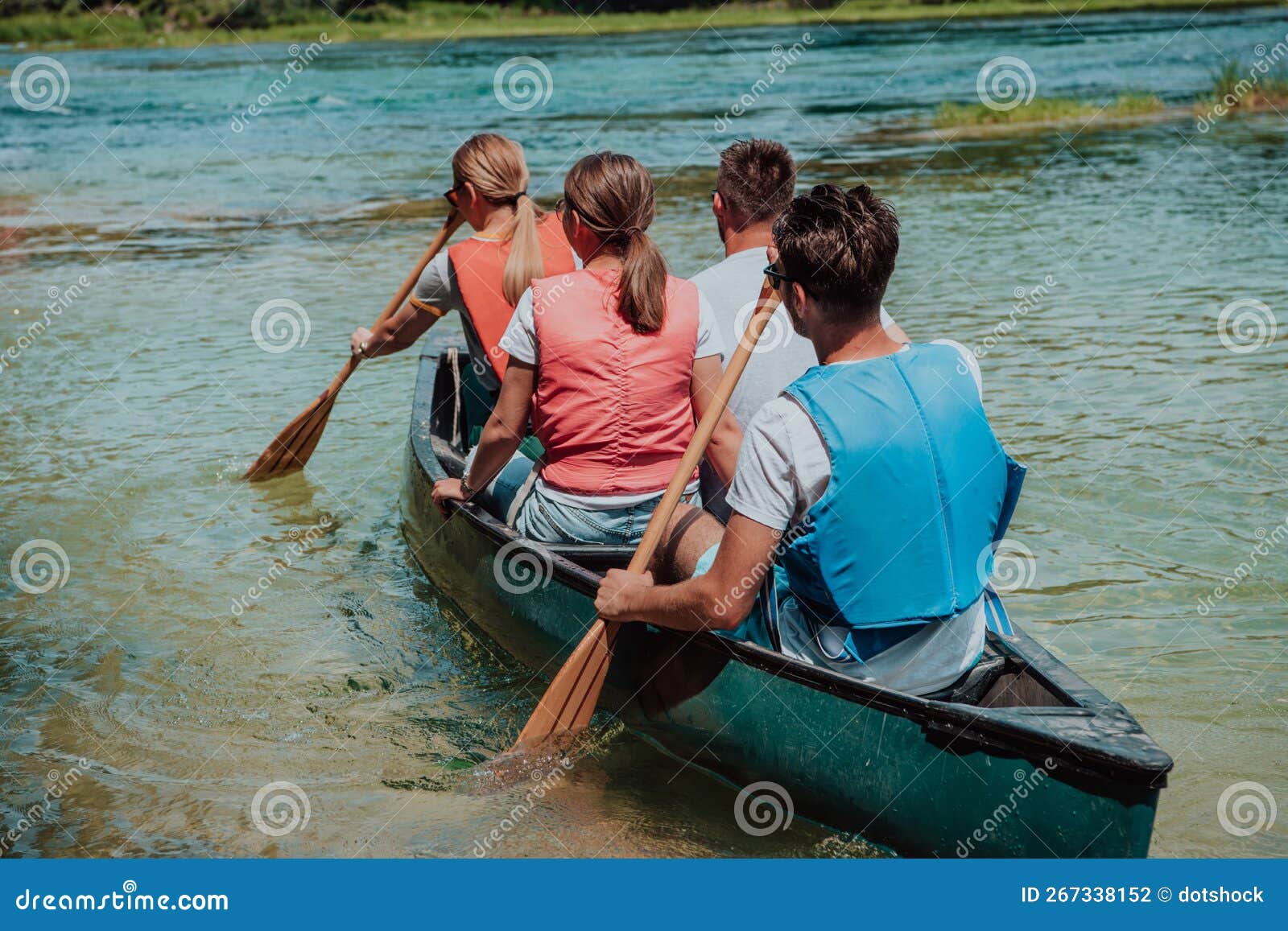 Group Adventurous Explorer Friends are Canoeing in a Wild River Stock ...