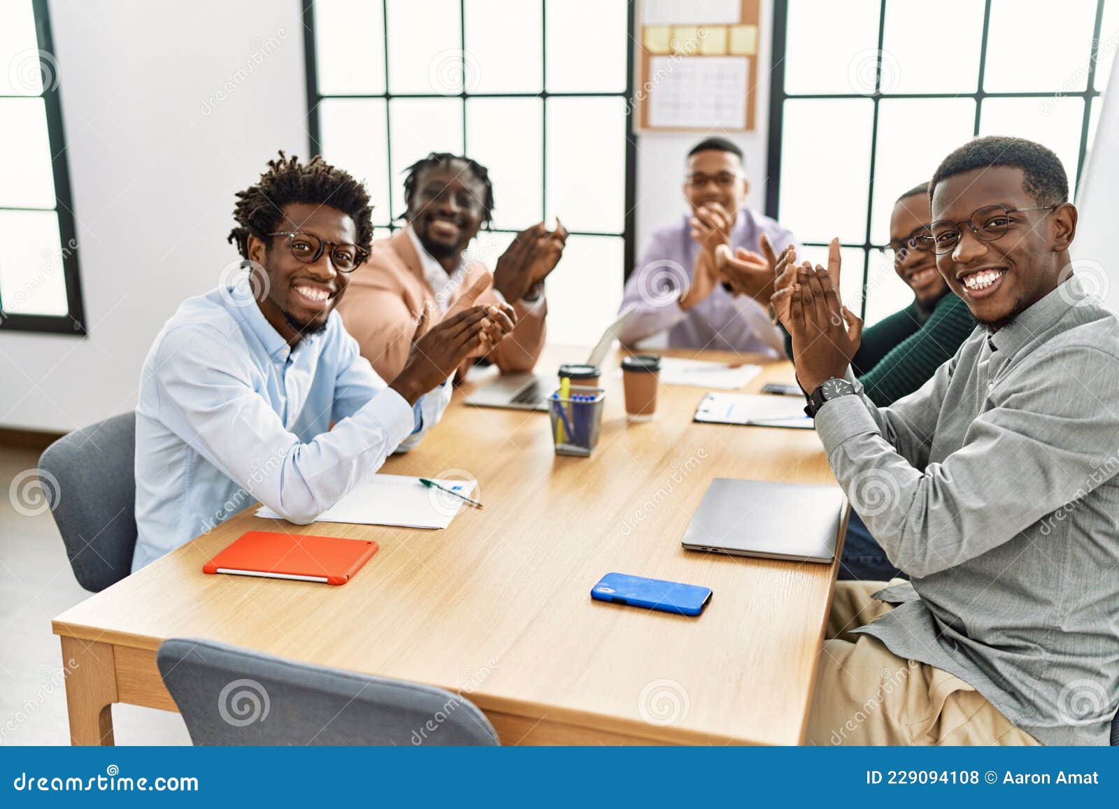 Group of African American Business Workers Smiling and Clapping Looking ...