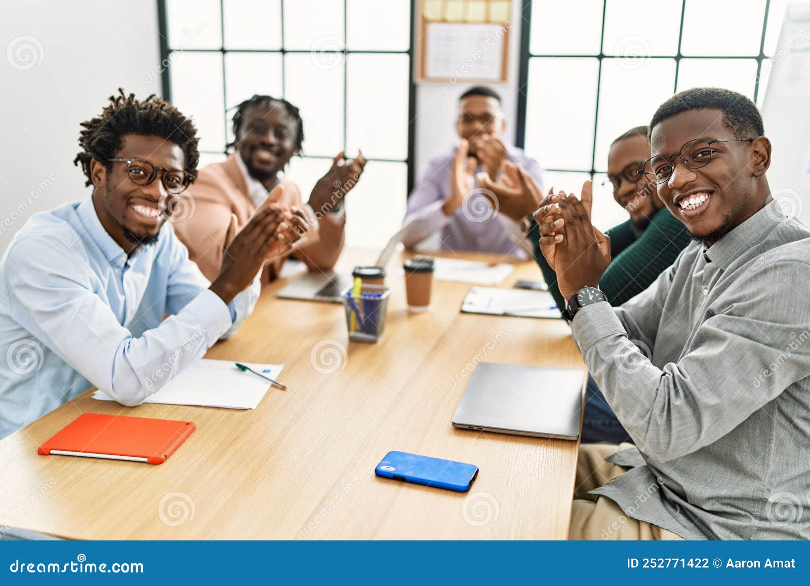 Group of African American Business Workers Smiling and Clapping Looking ...