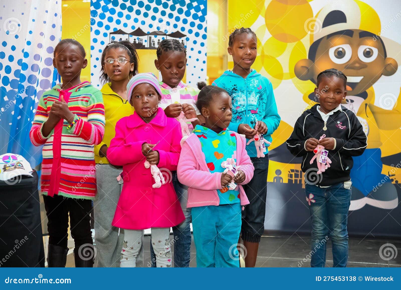 Group of African American Children with Prizes Posing at an Event ...