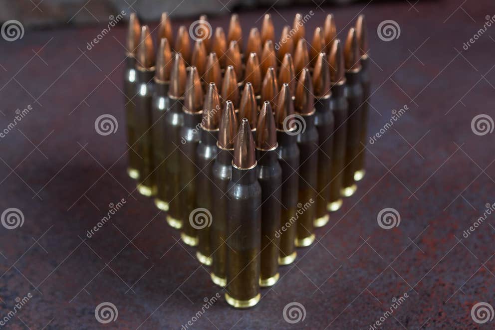 Group of Ammunition Geometrically Placed in Rows Stock Photo - Image of ...
