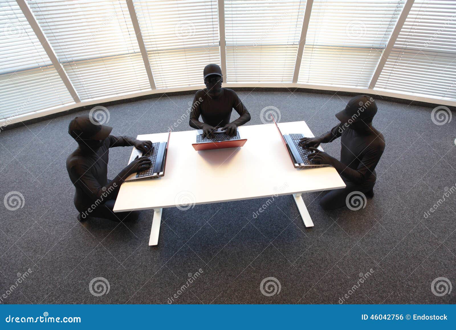 Group of Anonymous Hackers Working with Computers in Office Stock Photo ...