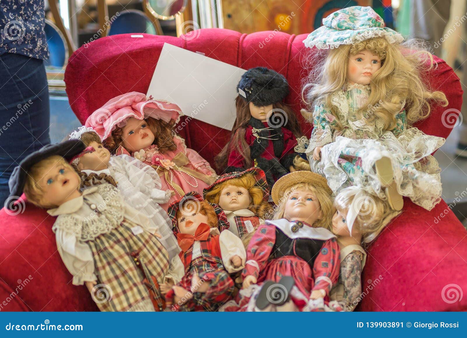 Group of Antique Dolls on a Red Couch Editorial Photo - Image of child ...