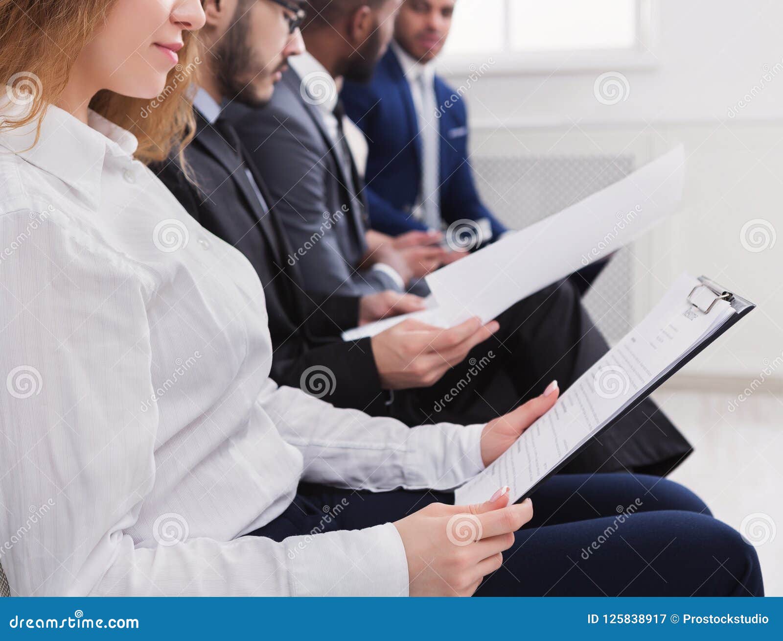 Group of Applicants Sitting on Chairs before Interview Stock Image ...