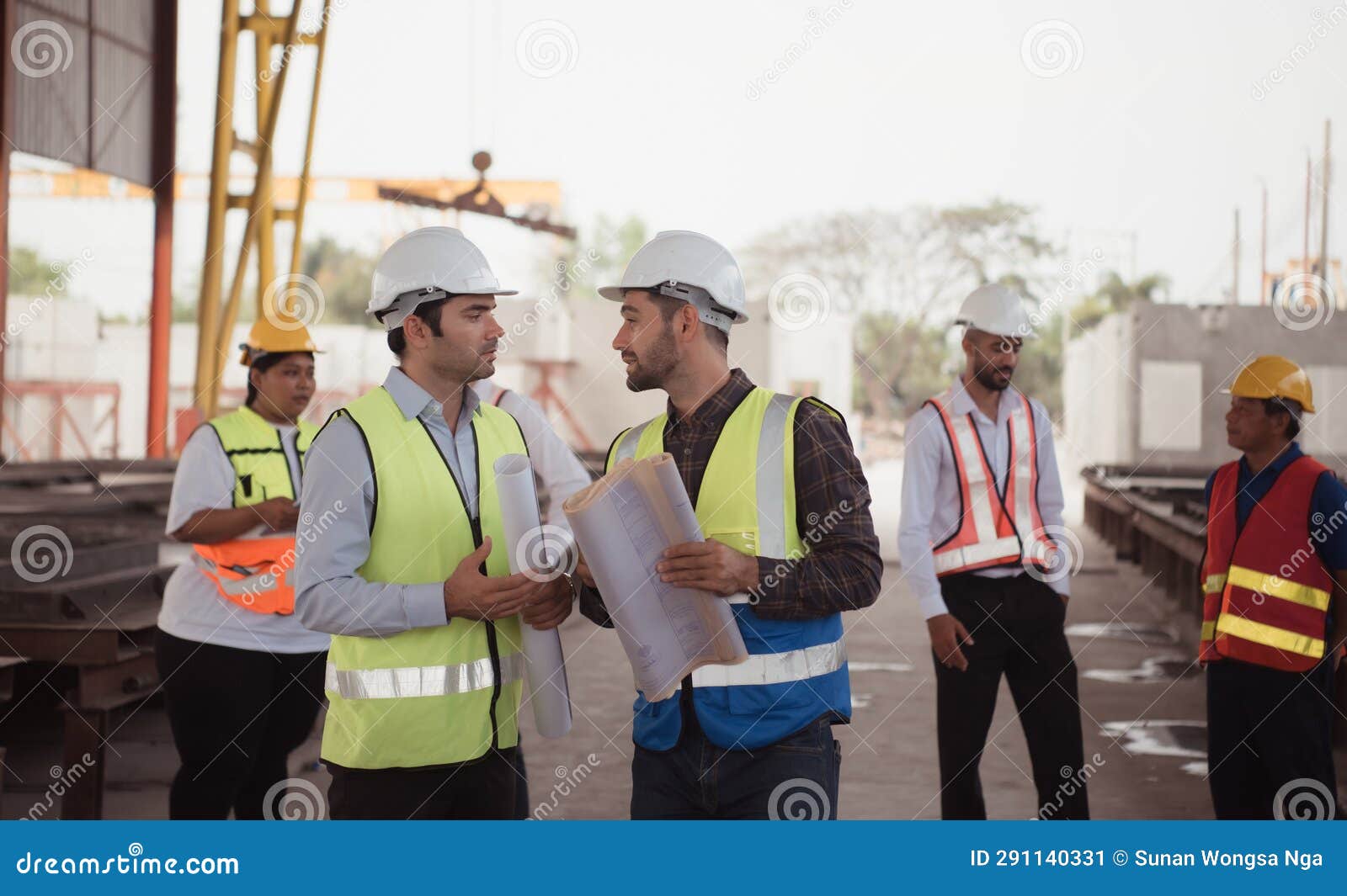 Group of Architects, Construction Foremen, and Construction Engineers ...