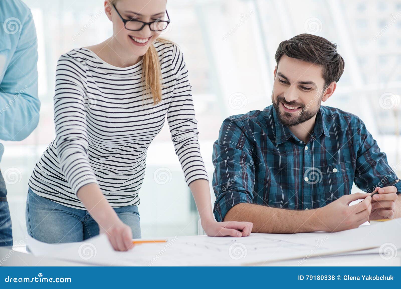 Group of Architects Discussing Plans in Modern Office Stock Photo ...