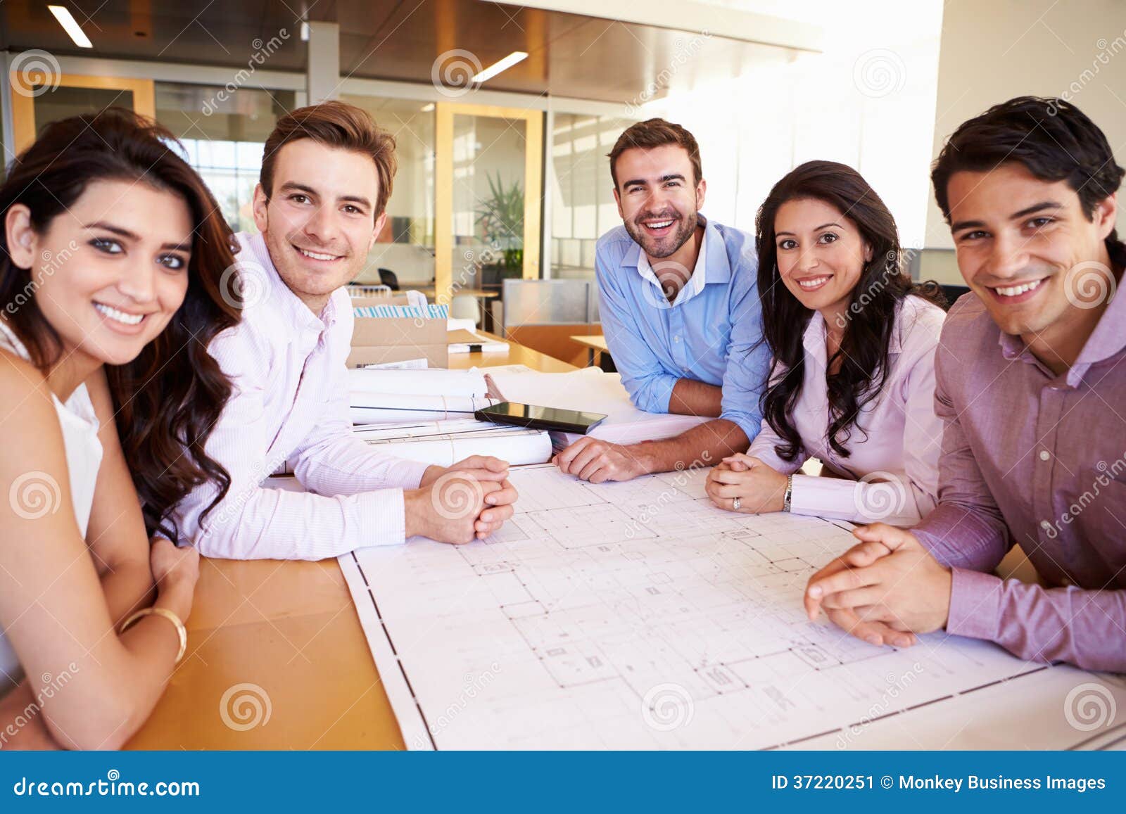 Group of Architects Discussing Plans in Modern Office Stock Image ...