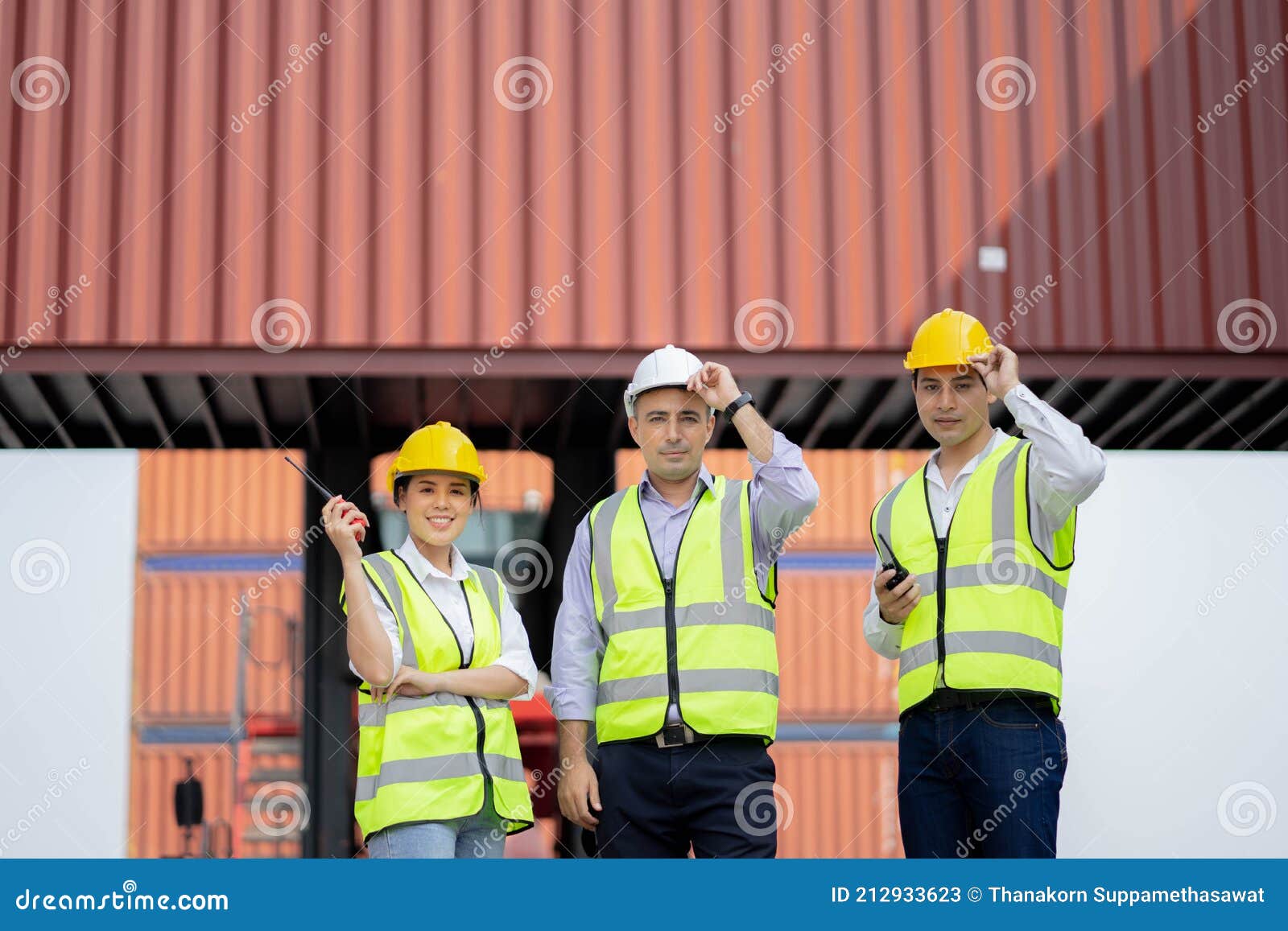 Group of Architects and Engineers at a Construction Site Smiling ...