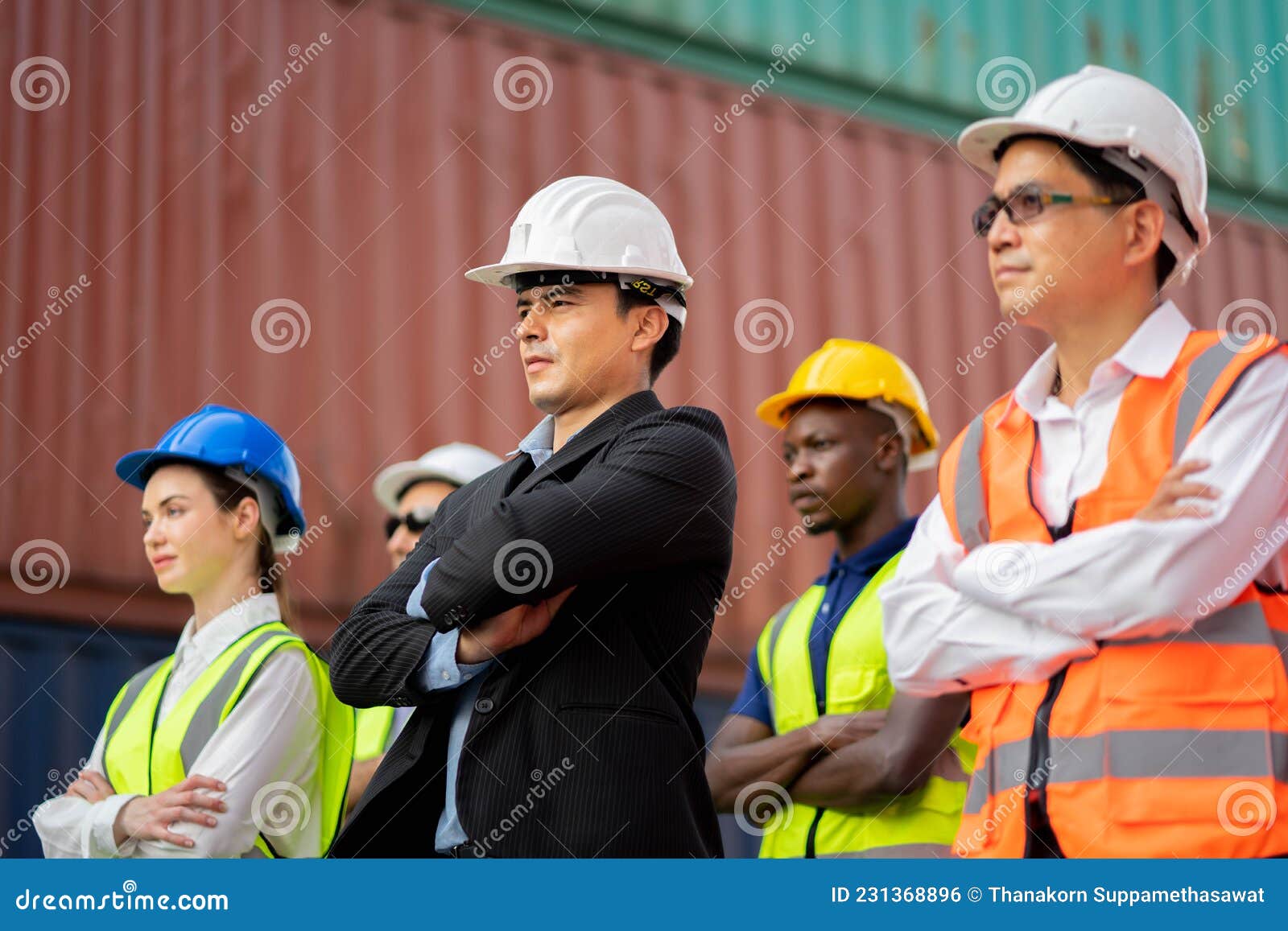 Group of Architects and Engineers at a Construction Site Smiling ...