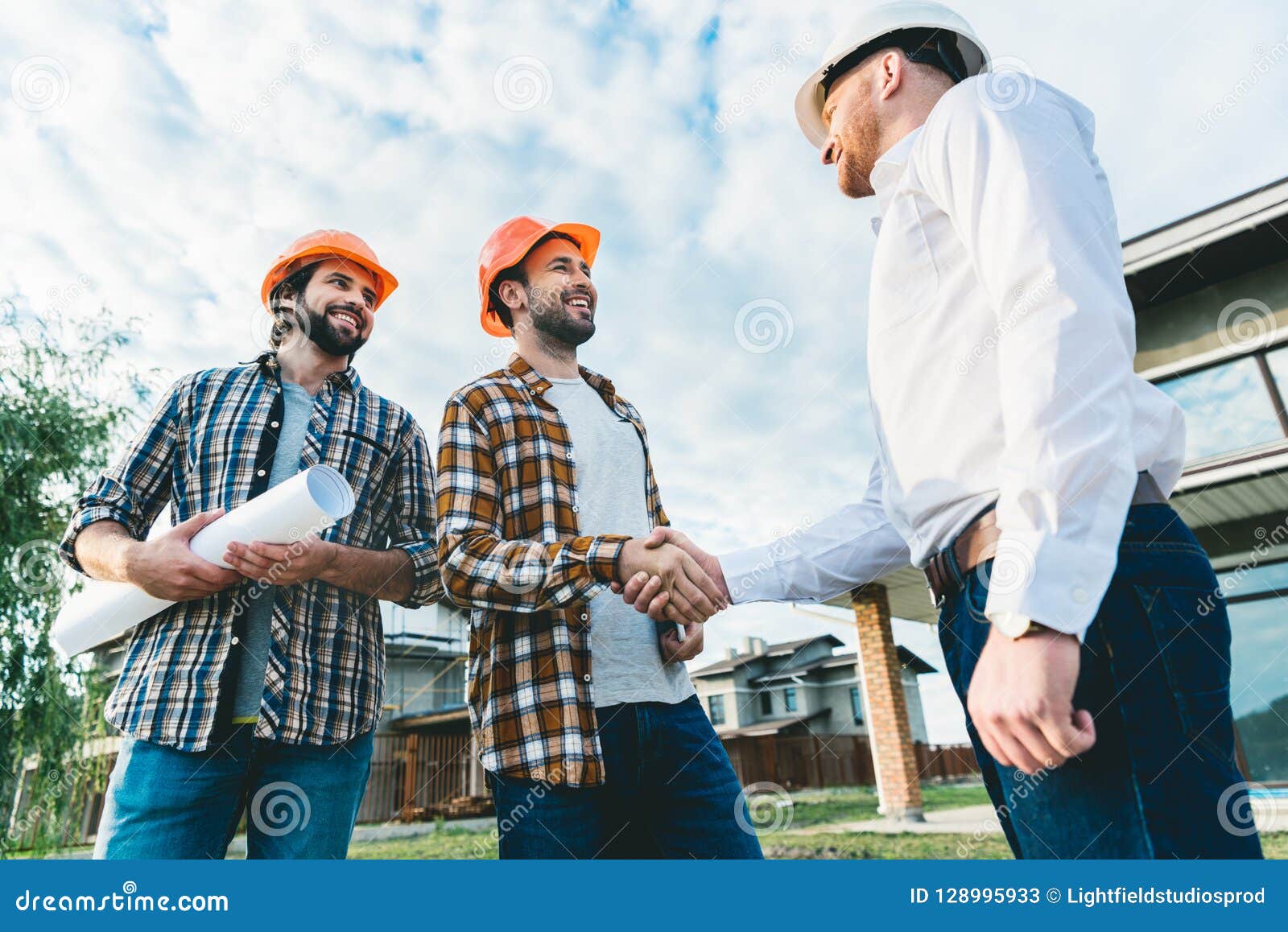 Group of Architects Having Conversation in Garden Stock Image - Image ...