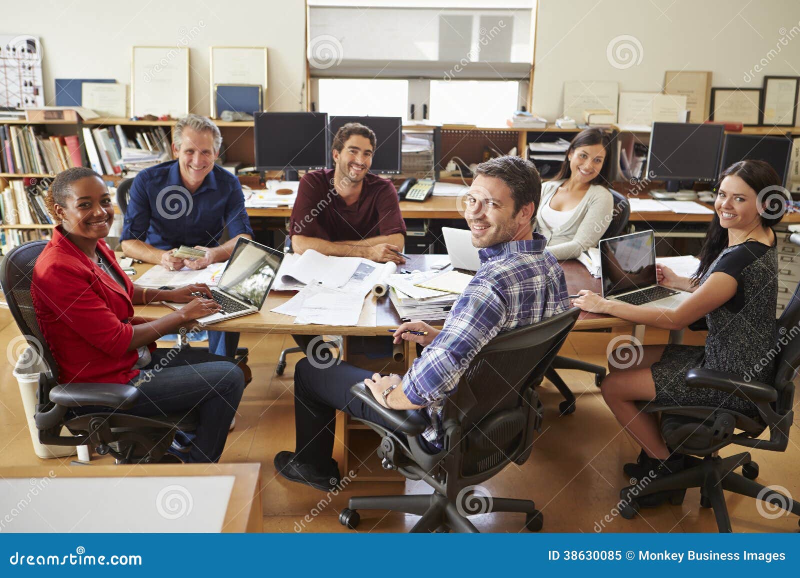 Group of Architects Meeting Around Desk Stock Image - Image of ...