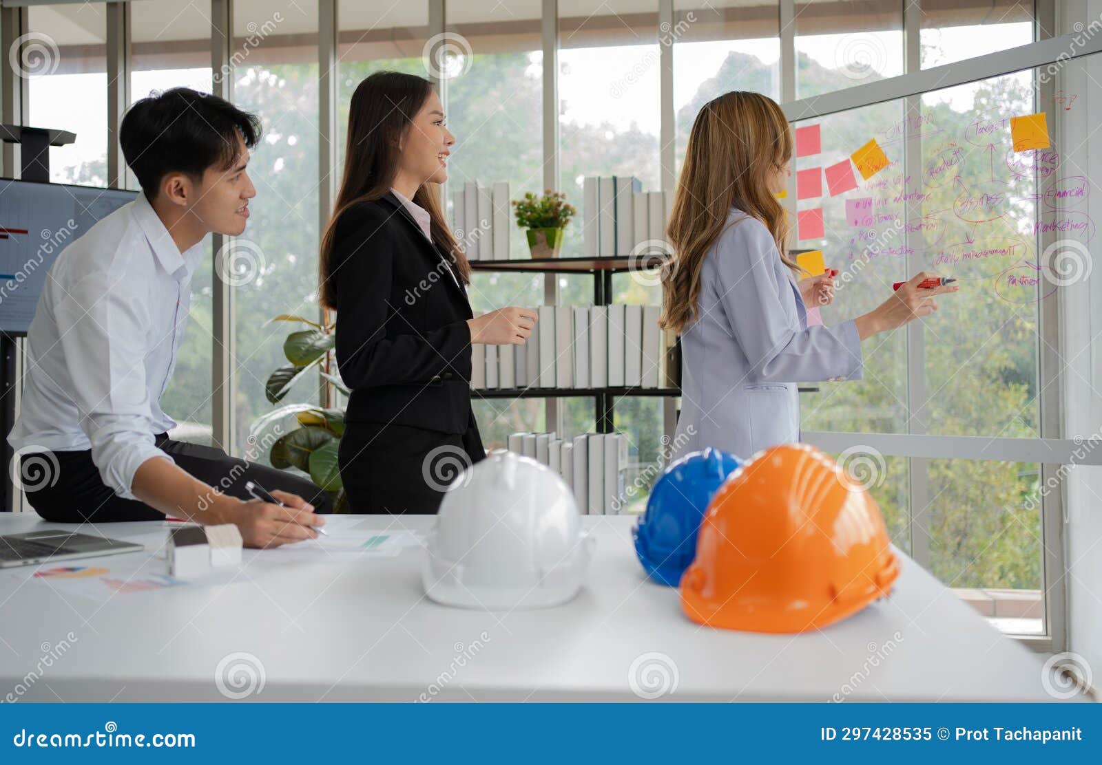 Group of Asian Businesspeople and Engineers Working and Brainstorming ...