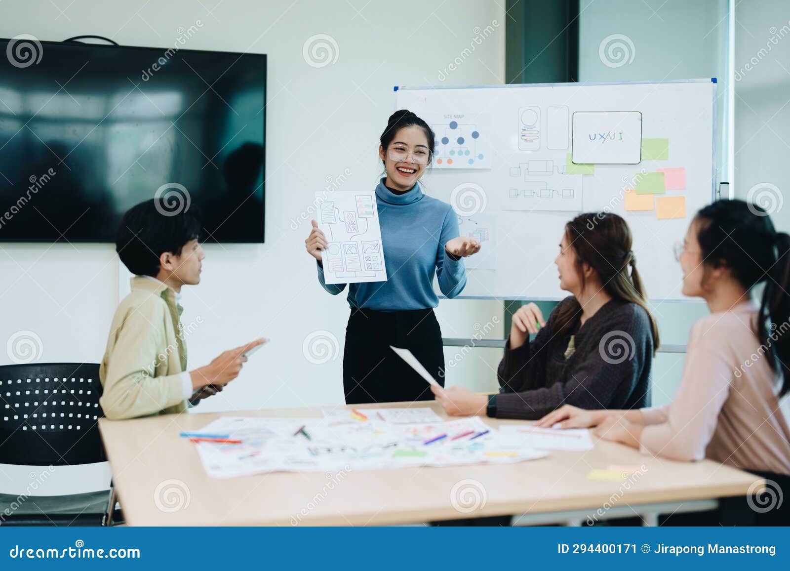 Group of Asian Creative Team Programing Designers Participate in All Phases of the UX UI Design ...