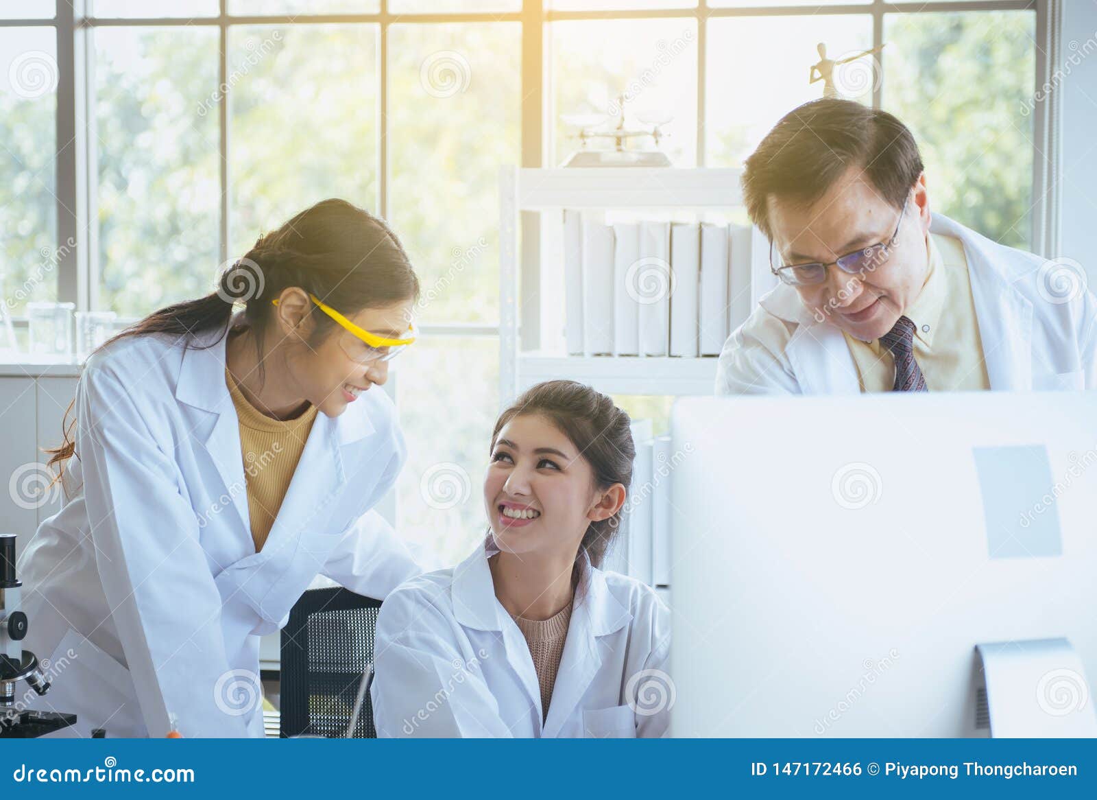 Group of Asian Medical Student Working and Analyzing Data Research ...